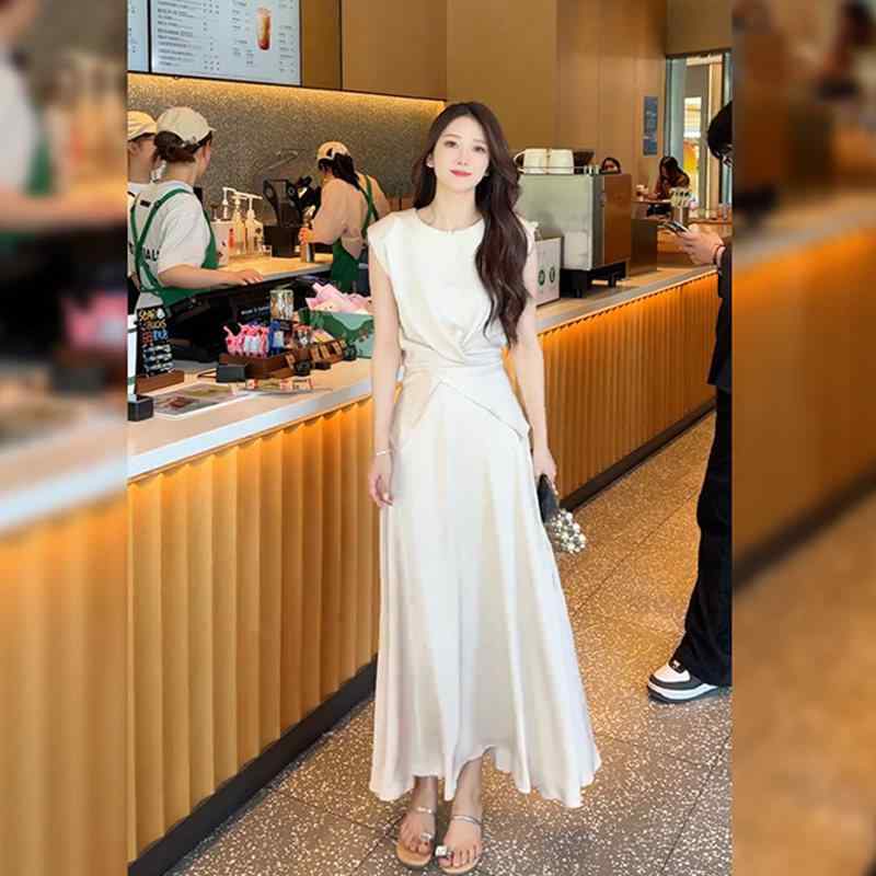 レディース ノースリーブ トップス アシンメトリー フレア スカート セット 夏 エレガント スタイル 女性らしい シルエット 軽やか ファッション 通勤 普段使い ブラウス ワンピース風 組み合わせ・商品構成: 2点セット・主な素材: ポ...