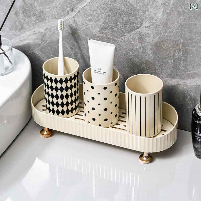 洗面セット 歯磨きカップ うがいカップ 歯ブラシホルダー 家族用 高級感 家庭用 バスルーム収納 コンパクト 機能的 日常使い・素材: プラスチック・スタイル: 潮流・カラー展開: セット1 (3カップ+1トレイ), セット2 (3カップ+...