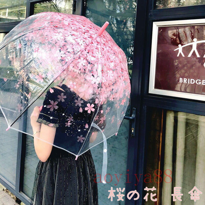 カラー：ブルー；ピンク；グリーン；パープル　（カラー選べる!!）重さ：330g素材：pvc骨の数：8本直径：80cmかわいいキッズビニール傘です！ビニール傘は視界もよく安心！ワンタッチタイプで開くの簡単！傘が開く時に、花吹雪の景色を見れます...