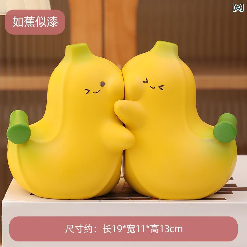 創意 的な 置物は 本の 枠を 貼って バナナの ように デスク トップの 酒場を 塗って 本棚の 家を 飾って 学生の カップルの プレゼントを 飾って います。材質: 樹脂貨物番号: MM9083-32ブランド: 宇曼カテゴリ: 動物パ...