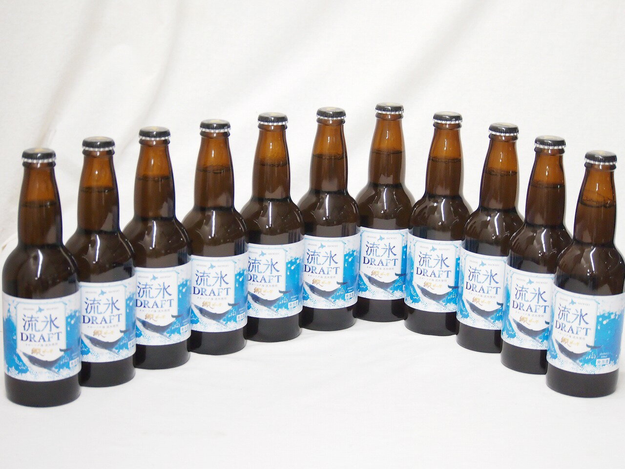 想的な青い発泡酒。爽快で軽やかな飲み口が、夏のひとときを彩ります。グラスに注ぐと、まるで冬の海を閉じ込めたような幻想的な色合いが広がるよ。香り：ホップの爽やかな香りがほんのり。 **味わい**：苦味は控えめで、すっきり軽やか11本セット(網...