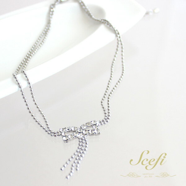 【※】大変申し訳ございませんが、当店ではお客様ご都合による商品交換・返品はお受けしておりません。 リボンモチーフが可愛いアンクレットです。ガラスストーンが埋め込まれたリボンモチーフがお洒落なアクセントに。細みのデザインなので、どんなコーデに...