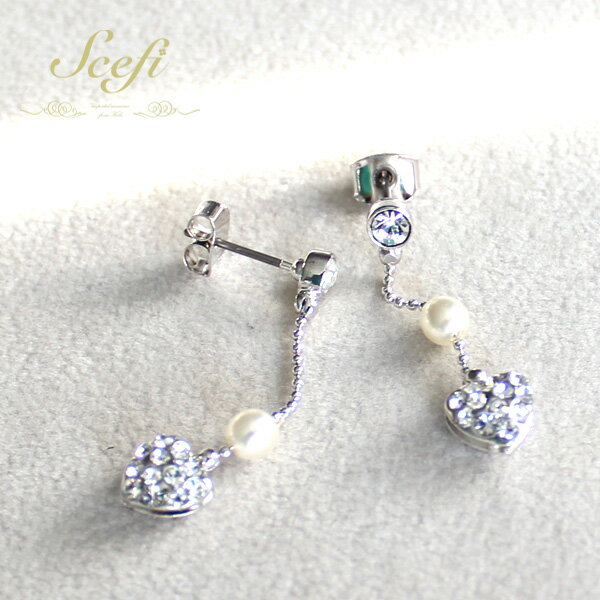 【※】大変申し訳ございませんが、当店ではお客様ご都合による商品交換・返品はお受けしておりません。 小ぶりのハートモチーフが揺れる可愛らしいピアス。小さなパールをポイントに女性らしいデザインです。 【素材】ガラスストーン、プラスチックパール、...