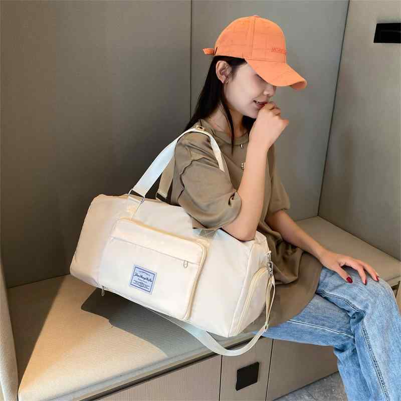 ・容量: 36〜55L・素材: オックスフォード生地・機能: 防水、負担軽減、収納可能、乾湿分離・性別: ユニセックス・裏地素材: ポリエステル・柄: 無地・スタイル: カジュアル・デザインポイント: ステッチ・カラー展開: ライトパープル...