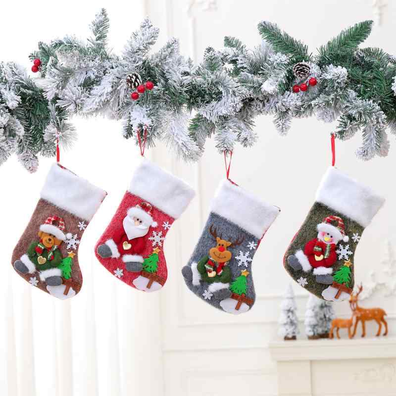 ・主な素材: 布・カラー展開: 大号白口袜【老人】、大号白口袜【雪人】、大号白口袜【小鹿】、大号白口袜【小熊】・スタイル: アメリカン・適用祝日: クリスマス