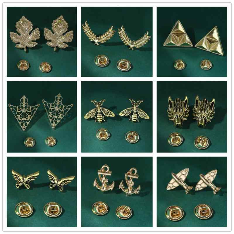 ・素材: 合金・スタイル: くり抜き三角形・対象: 男女兼用・加工: 電鍍・カラー展開: ゴールド、シルバー、アンティークゴールド、アンティークシルバー・モチーフ: ミツバチ、ヒョウの頭、純金属三角形、葉、麦穂、小翼、飛行機、錨、五芒星、槍...