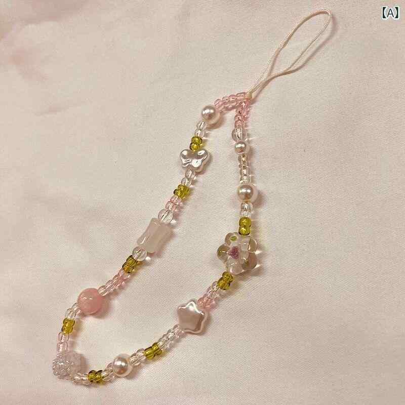 ・スタイル: 男女通用・主な素材: PVC・ストラップ素材: PVC・バックル素材: プラスチック・仕様: 白緑小花ネックストラップ・カテゴリ: スマホストラップ