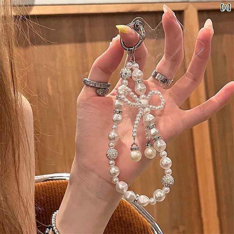 ・スタイル: 小清新、清新フェミニン・タイプ: キーホルダー・デザイン: 十字架、王冠、ローマ数字・デザイン要素: パール、貝殻、流星群、土星