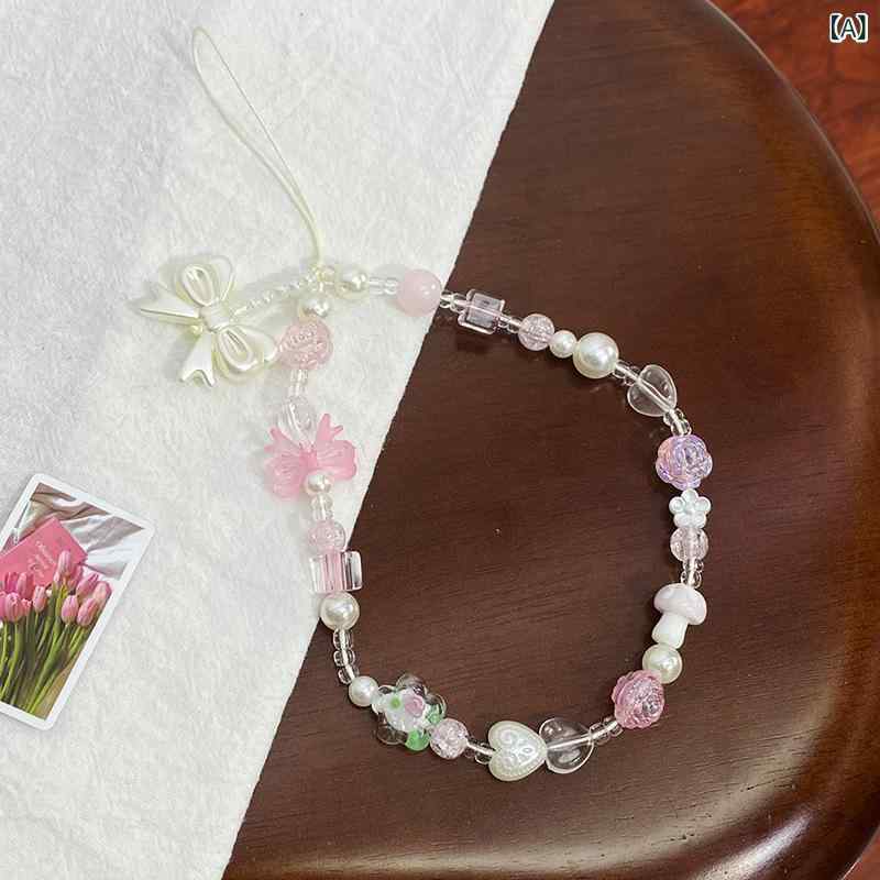 ・カテゴリ: キーホルダー・主な素材: プラスチック、樹脂・カラー展開: 琉璃小花、ワインレッド・スタイル: フレッシュ＆スイート・デザイン要素: パール、シェル、流星群、土星、クマ、子豚、小動物
