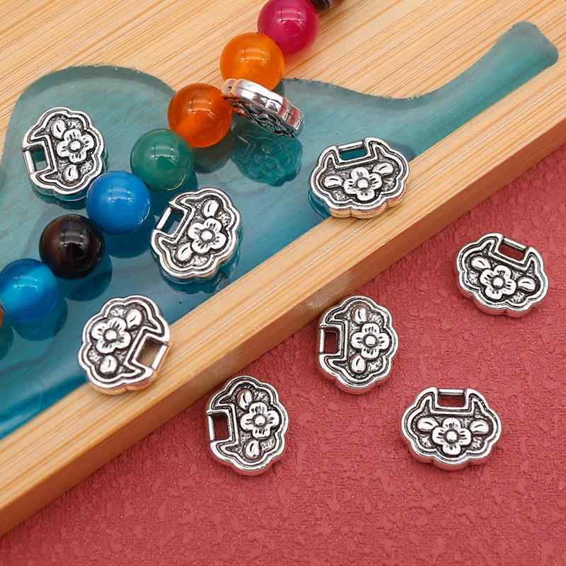 ・主な素材: 合金・カラー: 古銀・サイズ: 10×8×2mm・スタイル: レトロ・柄: 植物、花・モチーフ: 如意、平安ロック