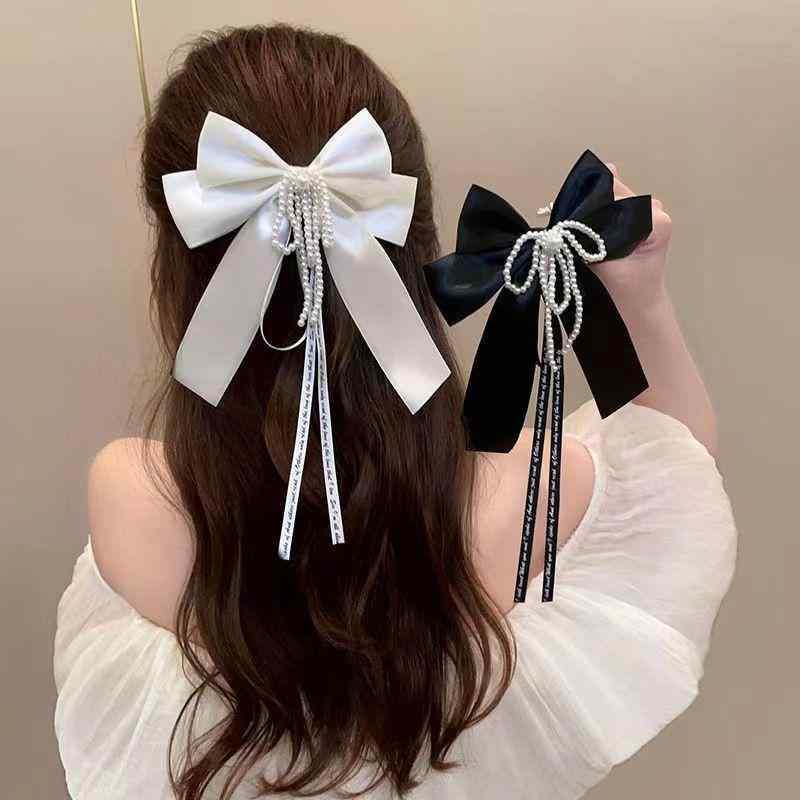 ・カテゴリ: ヘアアクセサリー・素材: 布・加工技術: 手作り・タイプ: バレッタ・カラー展開: ブラックリボンパールヘアクリップ、オフホワイトリボンパールヘアクリップ・デザイン特徴: リボン・スタイル: 韓国風、フレッシュ、フェミニン・対...