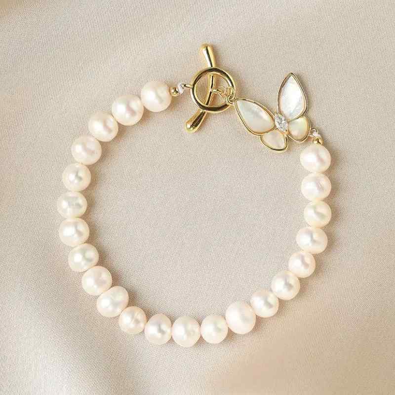 ・商品名: 蝶と真珠のブレスレット・種類: ブレスレット・真珠の種類: 淡水真珠・真珠の形状: ほぼ円形・真珠の直径: 6-7mm・カラー: ホワイト, ゴールド・アクセサリーの素材: 銅・スタイル: おしゃれOL・流行の要素: 人気, ラ...