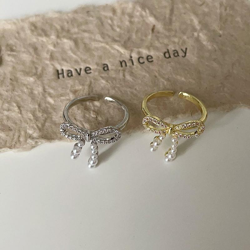 ・種類: リング、指輪・素材: パール・造型: 蝶結び・処理工艺: 電気メッキ・カラー: ゴールド、シルバー・流行元素: 蝶結び・スタイル: 日韓・めっき工艺: 14k・カテゴリー: 手飾り・対象: 女性・流行要素分類: 形状/パターン