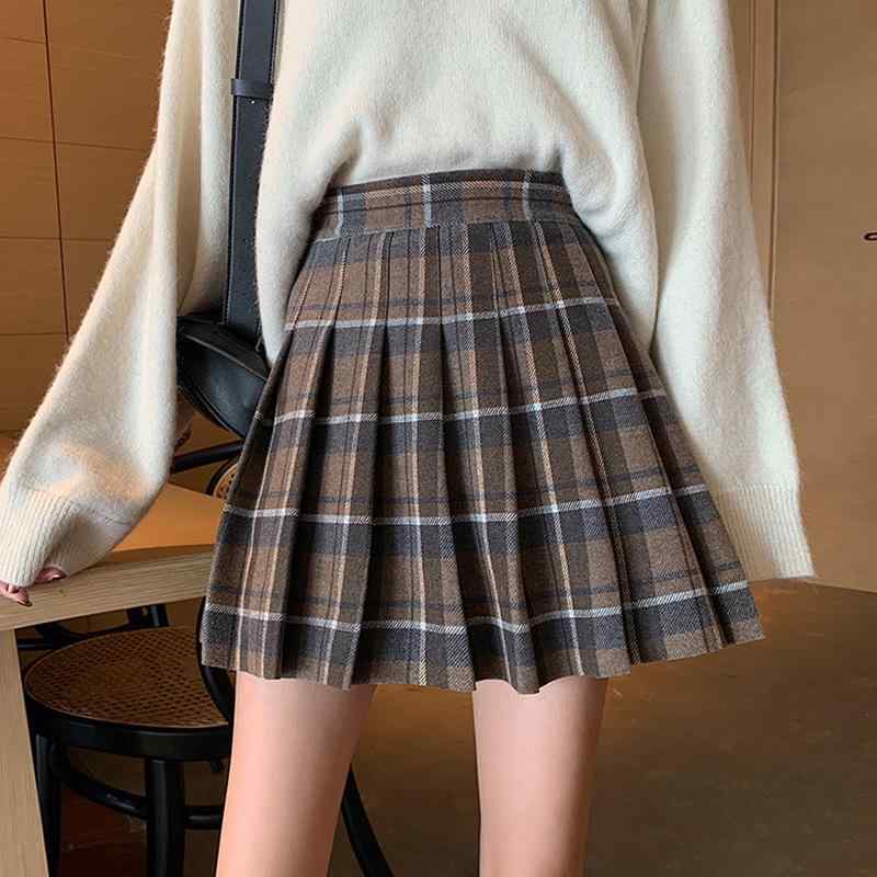 ・スタイル: 通勤風・カテゴリ: 半身スカート・スカート型: 百褶スカート・スカート丈: 短スカート・流行要素: 拼接・カラー展開: 卡其色、藏青色・サイズ展開: S、M、L、XL・主な素材: 毛呢・主素材含有率: 50%（含）-70%（不含）