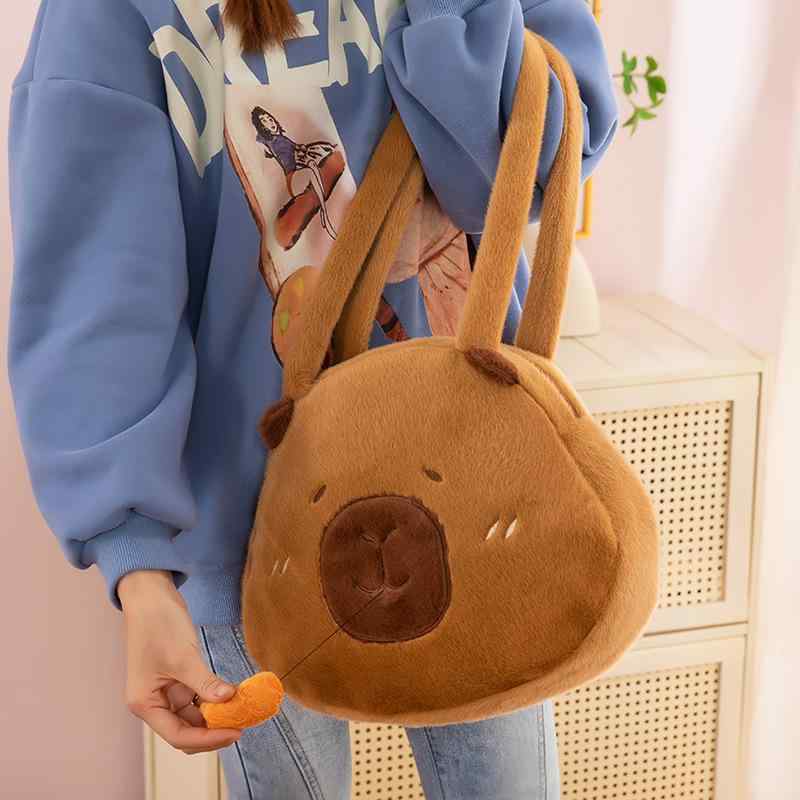 ・カラー: 抽拉小鱼款、抽拉鼻涕款・スタイル: ジェンダーレス・素材: フェイクファー・バッグのスタイル: トートバッグ・バッグのサイズ: 中・裏地: ナイロン・バッグの形状: 円形・開閉方法: ファスナー・バッグ内部構造: 携帯電話ポケッ...