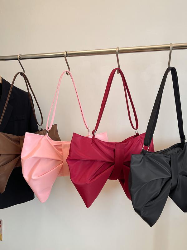 ・カラー: ブラック、レッド、ピンク、コーヒーブラウン・スタイル: シティミニマル・素材: オックスフォード・バッグのスタイル: 脇下バッグ・バッグのサイズ: 中・人気の要素: 蝶結び・裏地の質感: ナイロン・バッグの形状: 蝶結び型・開閉...