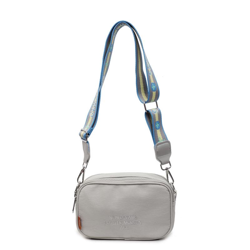 ・カラー: ブラック、米白色、グレー、パープル、白配黄・スタイル: 都市シンプル・素材: 帆布・バッグの形状: 横型・バッグのサイズ: 小・流行の要素: 文字・裏地の材質: ポリエステル・開閉方式: ファスナー・バッグ内部構造: 携帯電話ポ...