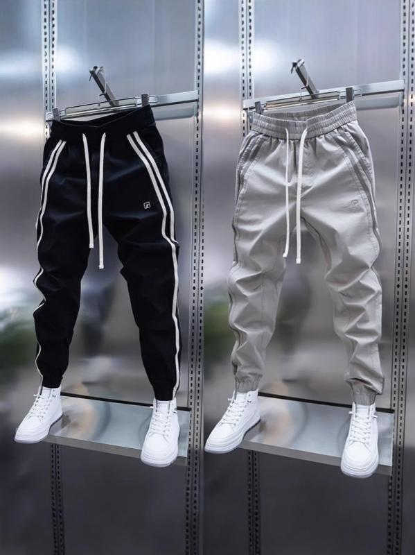 商品仕様: ・カテゴリ: カジュアルパンツ・スタイル: 軽熟、カジュアル・対象: 24～35歳・パンツ型: 束脚パンツ・シルエット: ルーズ・パンツ丈: フルレングス・ウエスト: ミドルウエスト・ベルト: 無し・前立て: 紐・厚さ: 普通・...