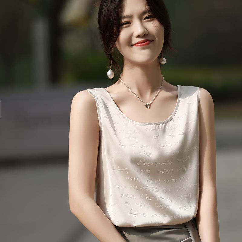 ・スタイル: 通勤風・袖スタイル: 吊帯・フィット: 通常・丈: 普通丈・柄: 無地・カラー展開: 白色、黒色、香檳色・サイズ展開: S、M、L、XL、XXL、XXXL・主素材: 90%～95%・伸縮性: 微弾・対象: 女性・対象年齢: 成...