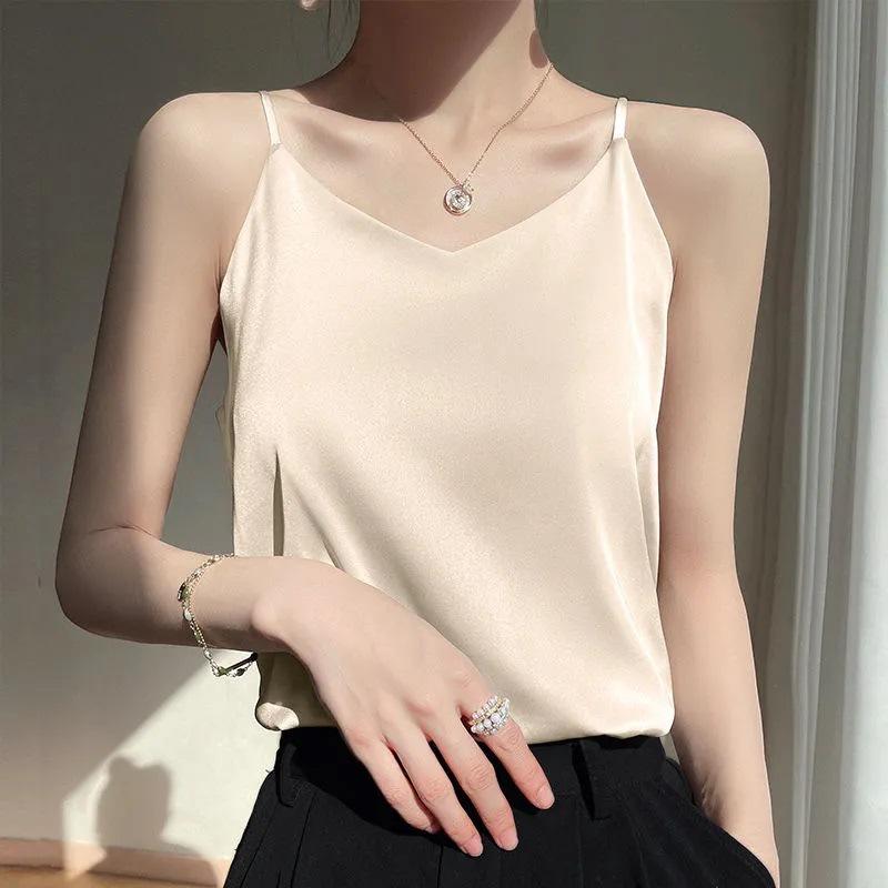 ・カテゴリ: Tシャツ・スタイル: 純欲風・主な素材: 仿真丝70%～80%・柄: 無地・デザイン: 吊帯、無袖、镂空、背带・ネックライン: Vネック・袖丈: 無袖・着丈: 普通(50～65cm)・カラー展開: 香槟色、白色、黒色・サイズ展...