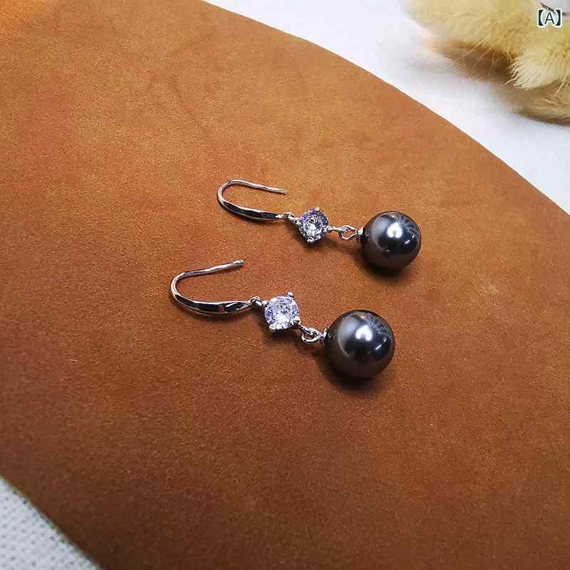 ・製品カテゴリ: 耳飾・スタイル: 清新甜美・主な素材: 925銀・形状: 几何型・加工方法: 電镀・流行要素: 珍珠、貝殻・カラー展開: 浅灰施家珍珠款、深灰施家珍珠款、白色施家珍珠款・対象: 女式