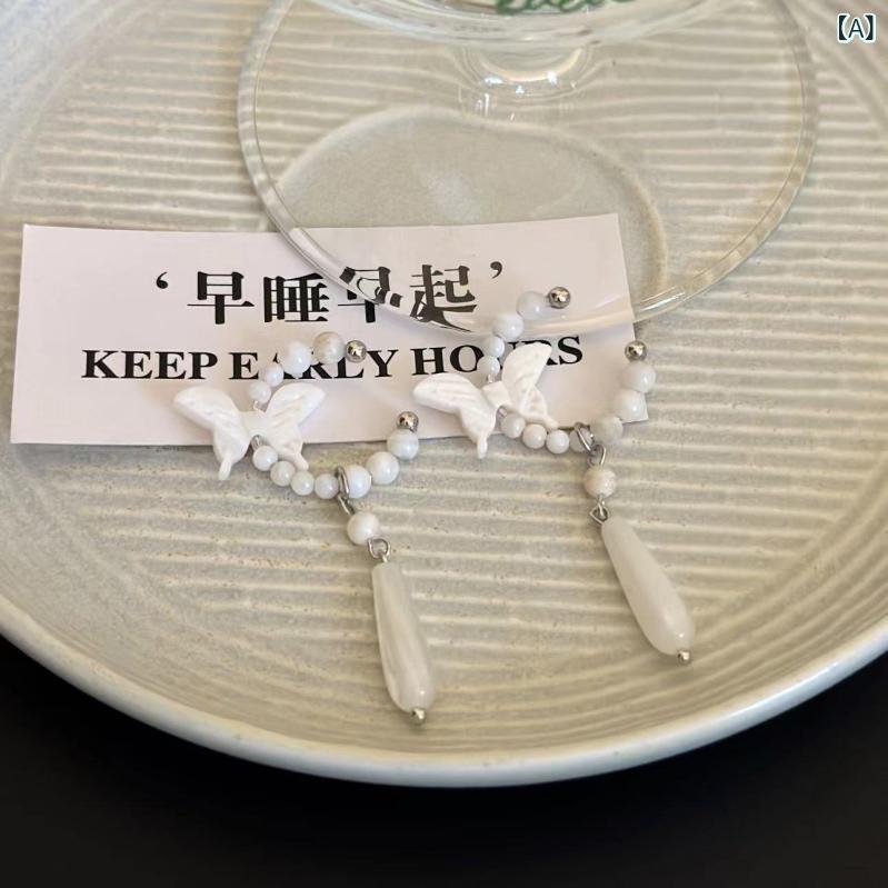 ・主な素材: 貝殻・スタイル分類: 個性風潮・製品カテゴリ: 耳飾・対象: 女式・形状: 動物/生肖・処理工法: 抛光・流行要素: 蝴蝶