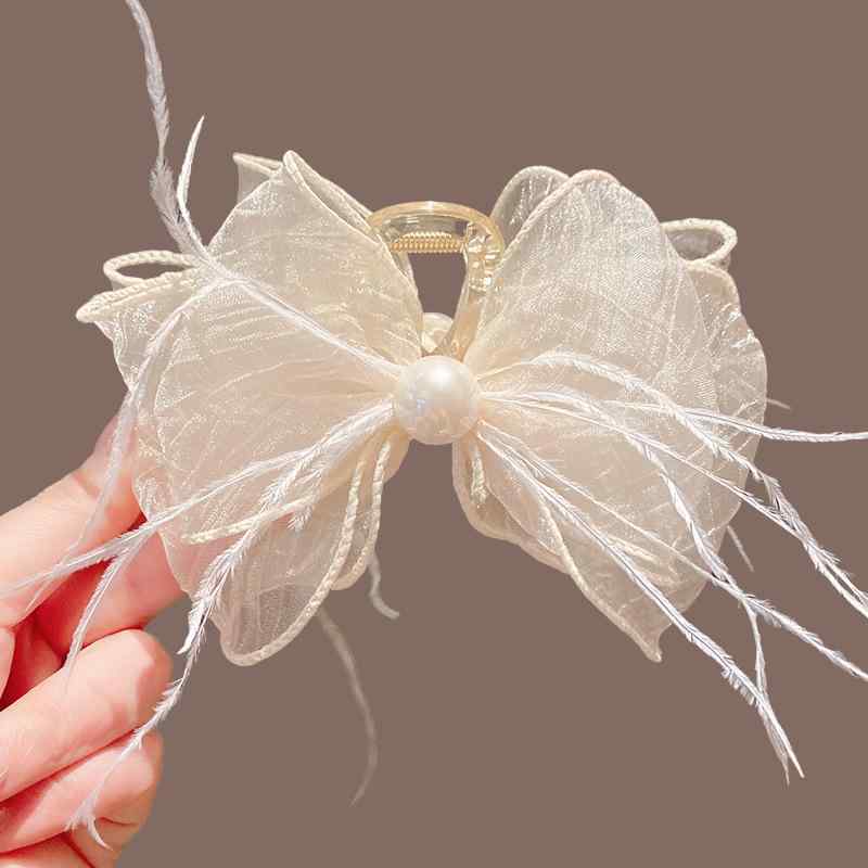 ・カテゴリ: ヘアアクセサリー・スタイル: 清新甜美・素材: 羽毛・カラー展開: 米羽毛,黒羽毛・装飾: 蝴蝶结,形状/图案