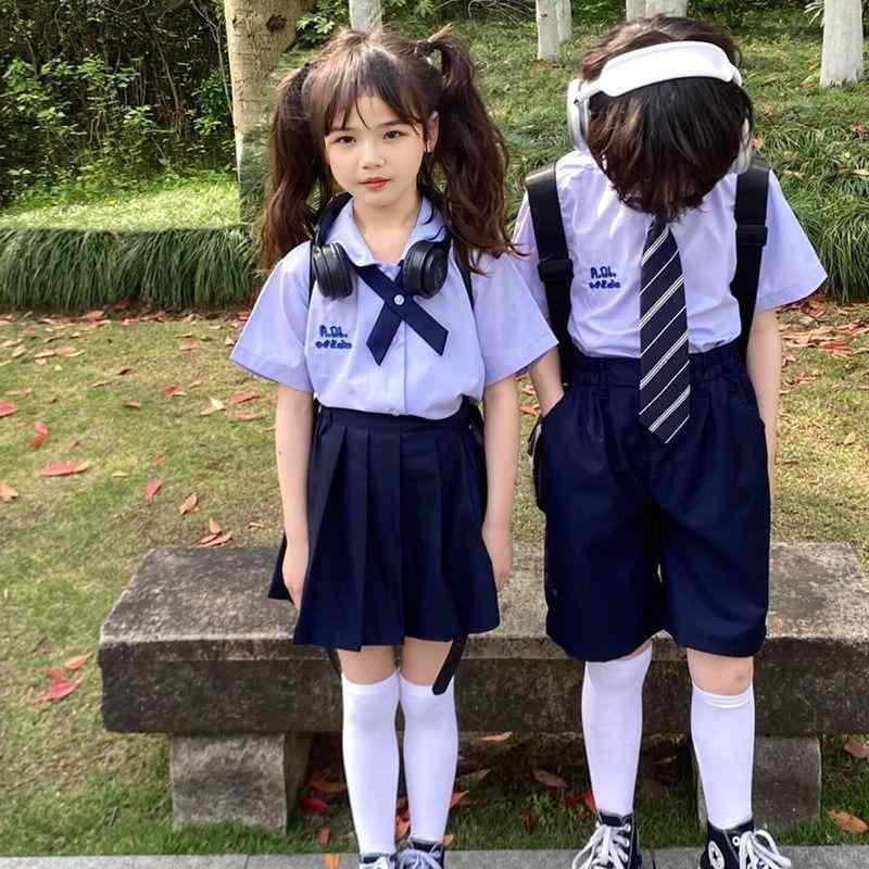 ・カテゴリ: 子供パフォーマンス服・スタイル: 学院風・要素: 可愛い・主な素材: ポリエステル100%・生地加工: プリーツ・適合季節: 夏・カラー展開: 淡紫短シャツ+紺スカート+クロスボウ+靴下,淡紫短シャツ+紺パンツ+リボンタイ+靴...