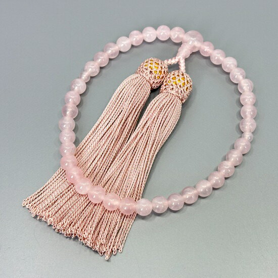 親玉：ローズクォーツ：約 10 mm 主玉：ローズクォーツ：約 7 mm 天玉：ローズクォーツ：約 5 mm 正絹頭房 女性用の片手(略式)数珠。どの宗派の方でもお使い頂けます。 ※（桐）箱入りではございません。 ※細心の注意を払って撮影し...