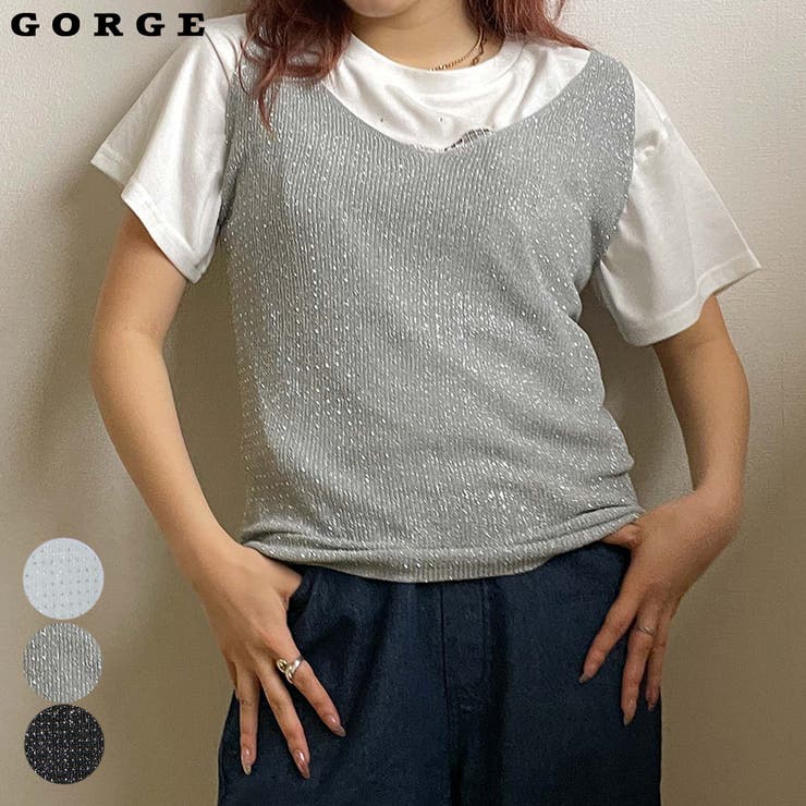 光沢感のあるニット生地を使用したタンクトップ。繊細な輝きを放つラインストーンを散りばめることで、映え度満点の一枚♪飽きの来ないベーシックな形はデイリー使いにもぴったりです◎サイズ：F 本体：着丈58cmバスト82cm裾幅40cm※平置き採寸...