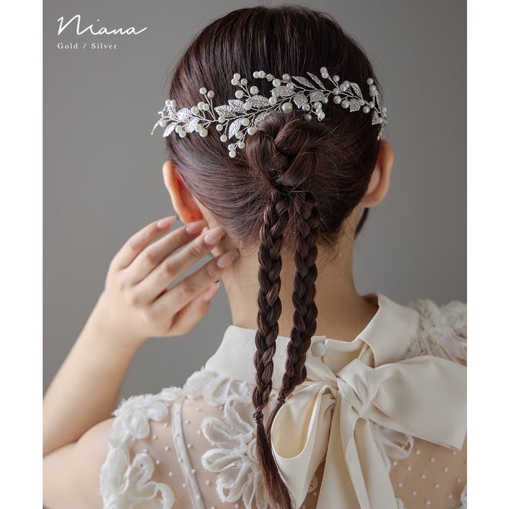 niana ニアナ 自然の美しさを感じさせるリーフとパールがあしらわれたヘッドドレスアクセサリー。繊細なリーフモチーフが髪に華やかさを添え、パールの輝きが清楚で上品な印象を引き立てます。ピン仕様になっているので付け外しもしやすく、お好みのバ...