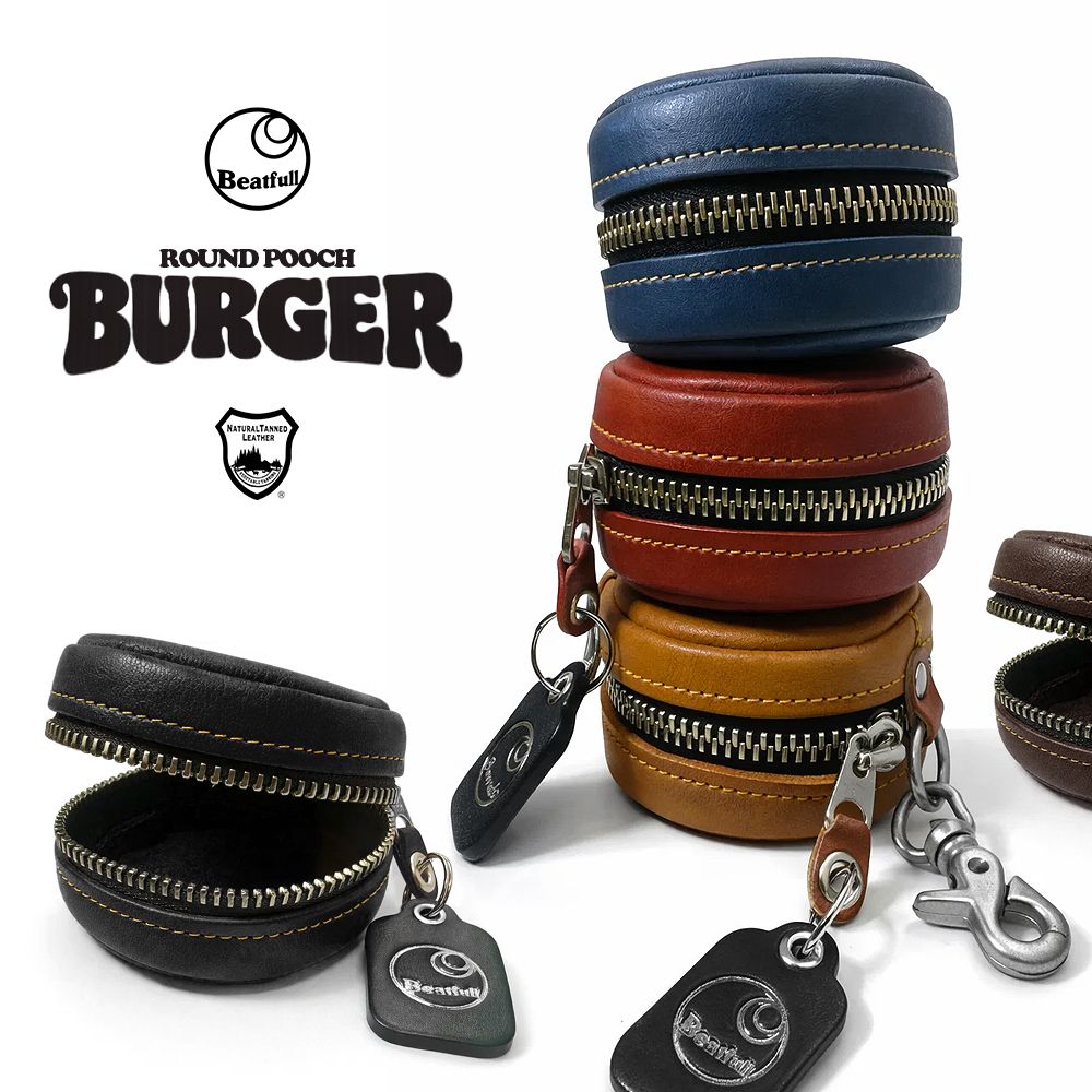 栃木レザー社製ヴォーノオイルレザーを採用したラウンドファスナー型のミニポーチ。 見た目がバーガーにもマカロンにも見えるこのポーチは、ナスカンが付いているので、ベルトループやバッグ等にぶら下げて持ち歩くことも可能です。 用途としてはコインケー...