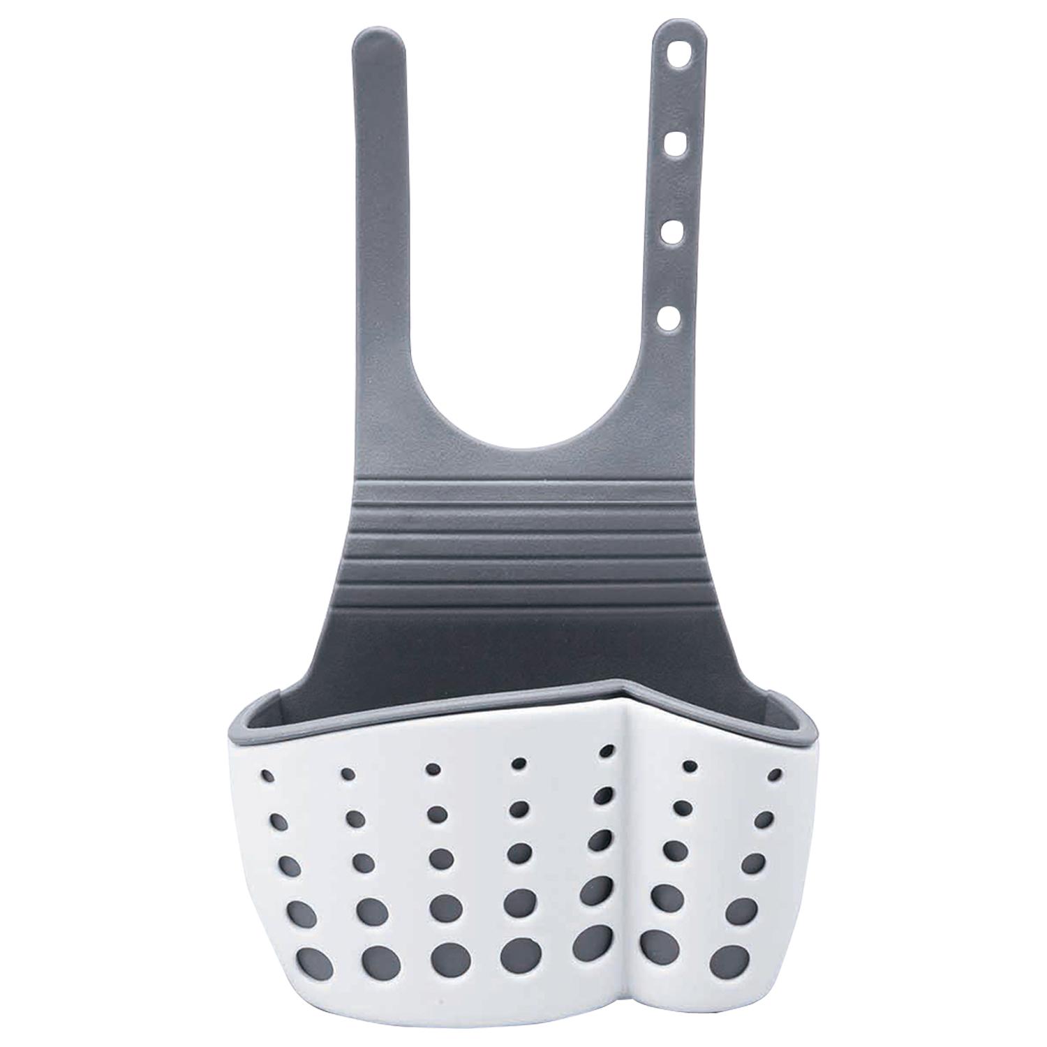 蛇口に吊るせるスポンジホルダー！落ちやすく場所をとる吸盤タイプと違い、水道の蛇口に直接吊るすので落ちない！スポンジとタワシがシンクにスッキリ収納できます。底面の水切り穴で水はけも◎取り付けはベルトで蛇口に吊るすだけ！ホックの留める位置でベル...