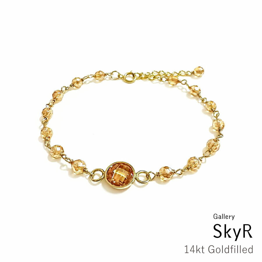 サイズ〔長さ〕最長 約19.5センチ(アジャスター 約3センチ) 〔内周〕約15センチ～約18センチシャンパンカラークォーツ(カット入り)約4ミリキュービックジルコニア約8ミリ(厚さ 約3.5ミリ)金種14ktゴールドフィルド ※ゴールドと...