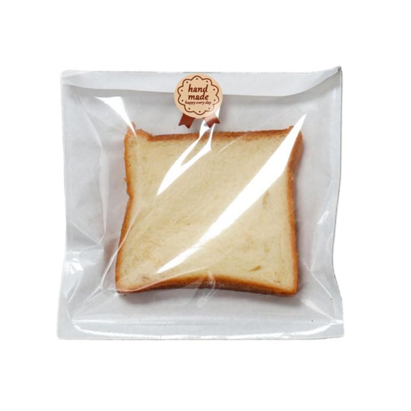 パン袋 焼きたてのパン袋 サンドイッチバッグ ベーキング包装 クラフト紙 セミフィルム紙 ヒートシール可能 電子レンジ対応可 ラッピングシール付き 白 100枚入り1