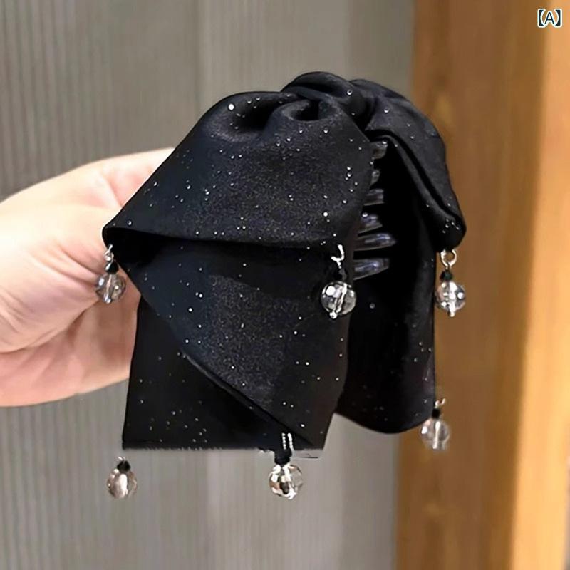 赫本の 高級 感の 星の 光が 輝く 馬尾は 女性の 新型の リボンを 持って います。商品番号: YY7985-14ブランド: ユイジュエリースタイル: 女性の,韓国語版韓国風ヘアピンの分類: グリッパーORIGIN: 義烏主な下流プラッ...