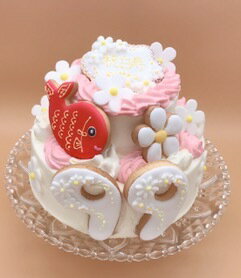 お祝いケーキ（白寿）5号（15センチ）￥10,200 2段ケーキで賑やかにお祝いしよう！ 白寿のお祝いに最適です。華やかなデコレーションに、アイシングクッキーの数字の99と可愛い鯛が付きます。アイシングクッキーは別添えですので飾り付けも楽し...