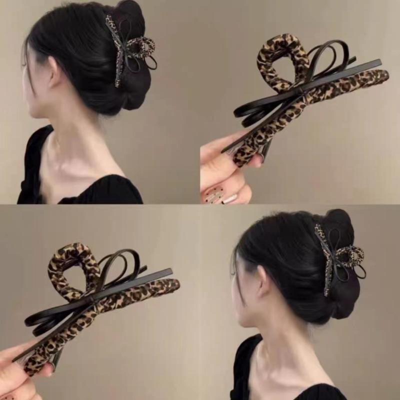 ・カテゴリ: ヘアアクセサリー・タイプ: クリップ・スタイル: 個性派・柄: 豹柄・装飾: 蝶結・対象: 女性用・素材: 布製