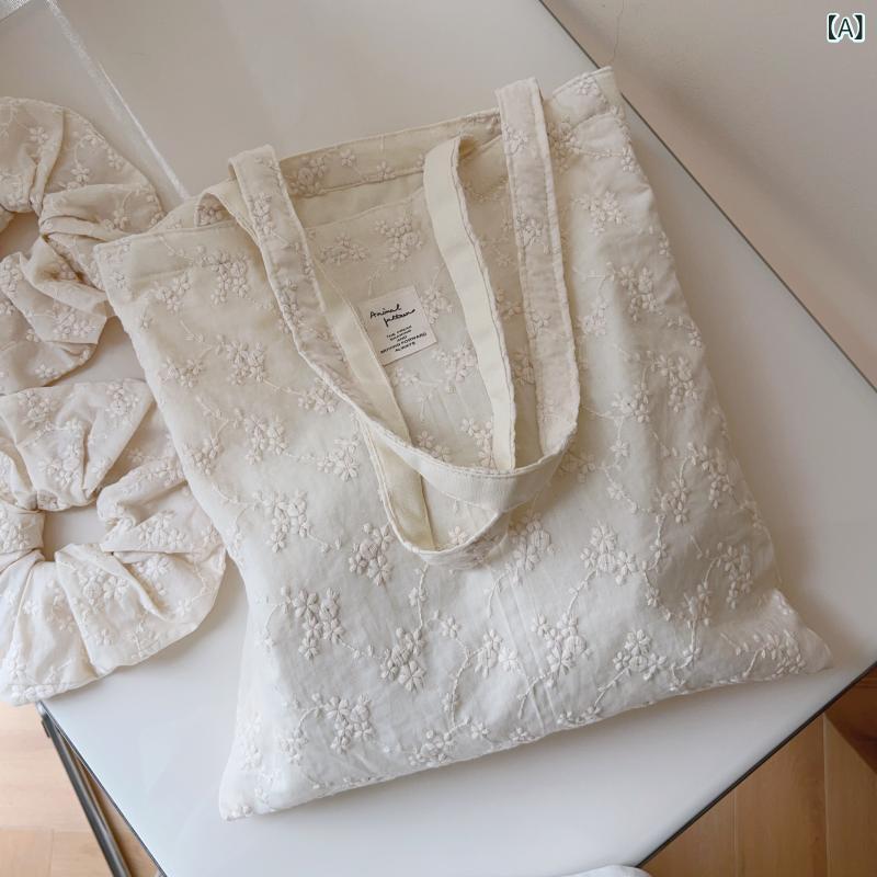 ・スタイル: シンプルラグジュアリー・主な素材: 綿・カテゴリ: トートバッグ・バッグサイズ: 中・柄: 刺繍・裏地: 帆布・形状: 縦型方形・開閉方式: オープン・内部構造: スマホポケット・硬さ: ソフト・肩紐: 2本・使用シーン: 日常
