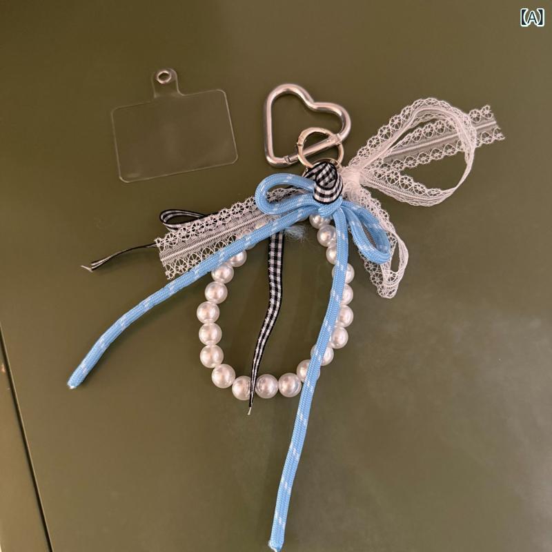 ・主な素材: 混合素材・カラー展開: ブルーリボン+白パール、ブラックリボン+黒パール、ホワイトリボン+シルバービーズ、ステンレスチェーン（70cm）・スタイル: 韓国風・種類: キーホルダー・柄: ハート、水滴、鈴・装飾: リボン・テイス...