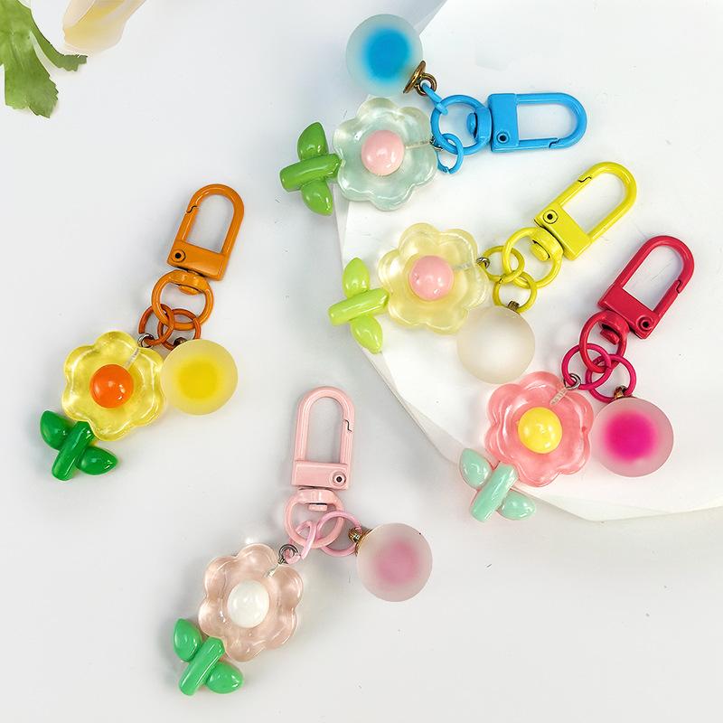 ・カテゴリ: キーホルダー・素材: プラスチック、樹脂・カラー展開: ローズレッド、ピンク、ブルー、オレンジ、ライトイエロー・スタイル: スイート、フレッシュ・デザイン: ひまわり、植物、花
