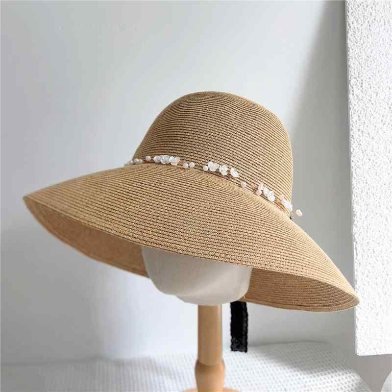麦わら帽子 レディース バケットハット 漁夫帽 UVカット 紫外線対策 日焼け防止 折りたたみ可能 あご紐付き エレガント リゾート 旅行 ビーチ 草編み 花飾り パール ビーズ 蝶結び