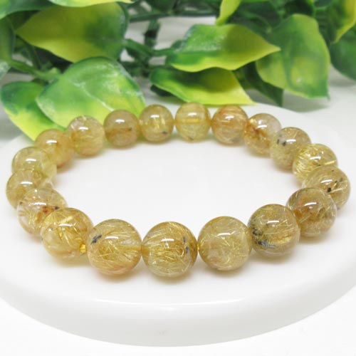 ・太陽ルチルインクォーツ ・10.5ミリ玉 ・内径16.5センチ※天然石にはインクルージョン（内包物）、クラック、多少の欠けなどが入るものもあります。ご了承ください。パワーには影響ございません。※天然石のため色、模様、形状等が多少異なる場合...