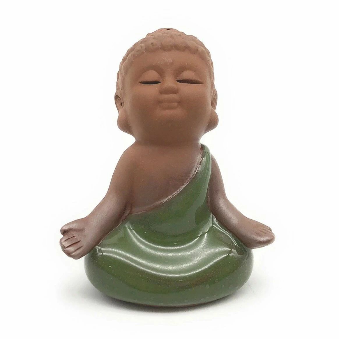 茶玩とは茶龍とも呼ばれ、主に中国茶で使用する茶盤の上におくマスコットのような置物です。お茶を掛けることによって、色つやが深みを増していくので、育てて楽しむことができます。中国茶をされない方は、置物としてお使いいただけます。瞑想中の仏像さんの...