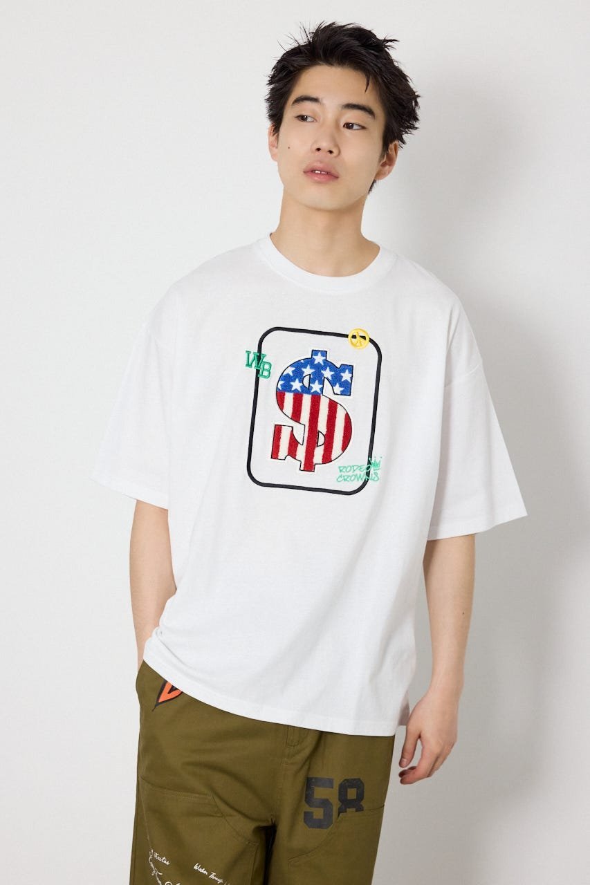 RODEO CROWNS WIDE BOWL（ロデオクラウンズワイドボウル）US rich Tシャツ■ポイントキャッチーなアメリカンフラッグモチーフでデザインされた半袖Tシャツです。■ディテールバックスタイルは全面にサインボード風プリント、...