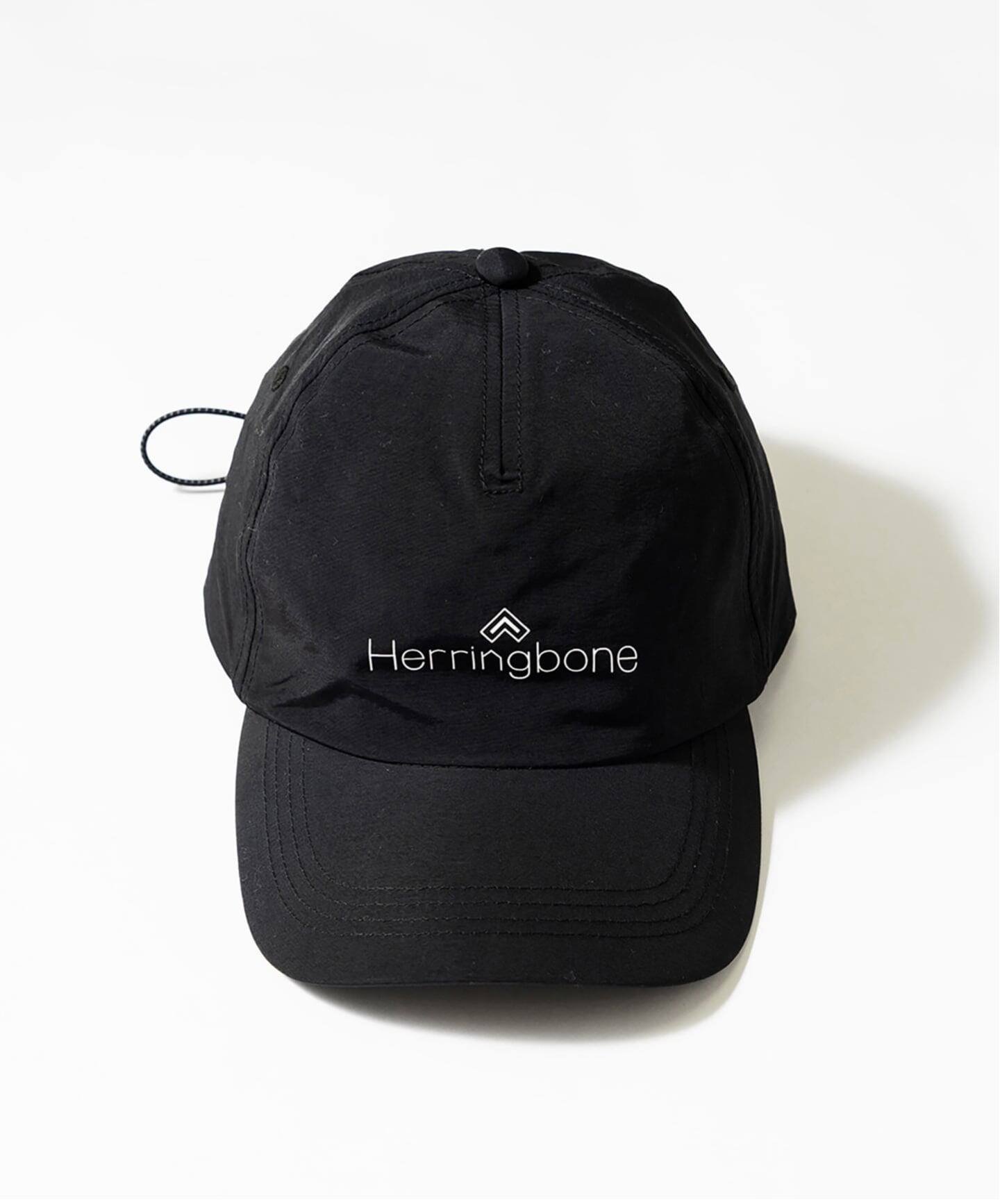 HERRINGBONE（ヘリンボーン）"Herringbone" 5 Panel cap・アイコニックなHerringboneのロゴデザインをあしらった、5パネルのキャップ・軽量で程よくハリのある質感・ドローコードとストッパーを用いて、サイ...