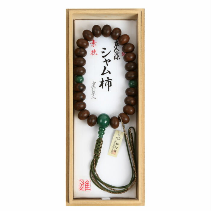 多くの宗派で、法事等幅広くお使いいただける男性用略式念珠です。 世界的にジリコテとして知られる木目の美しい高級木材、シャム柿を用いた念珠です。親玉、二天にはインド翡翠を用いています。 インド翡翠（アベンチュリン）は深い癒しのエネルギーでスト...