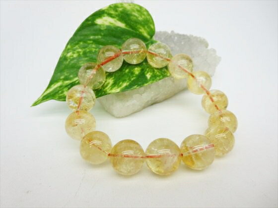 【ブレスレット】 天然シトリン ☆商品情報☆ 石サイズ：Φ14〜14.9mm 粒数：15粒 重さ：約62g 手首周り：約17.5cm 原産地：ブラジル ※照明等の関係で実際の色と多少イメージが異なる場合がありますのでご了承ください。 ※こち...