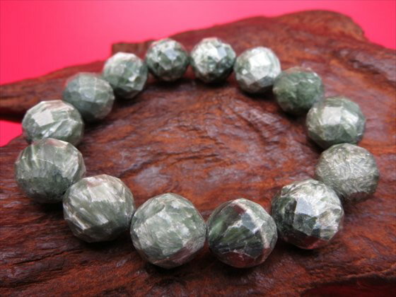 【ブレスレット】 セラフィナイト ☆商品情報☆ 石サイズ：Φ13±0.4mm 粒数：14粒 重さ：約41.5g 手首周り：約16.5cm 原産地：ロシア ※形状やサイズのばらつき、表面や穴周りにキズや凹み等があります。 ※照明等の関係で実際...