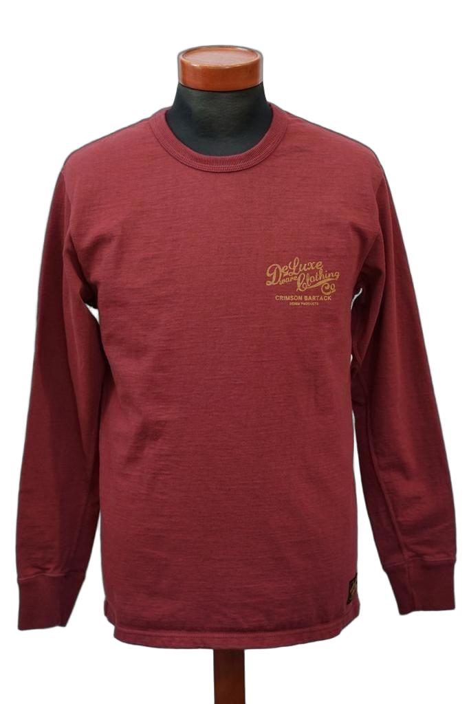 　デラックスウエアの長袖Tシャツ BRGX-264 "CRIMSON BARTACK" です。 　ヴィンテージ古着の天竺(ニット)素材を参考に、日本に数台を残すのみとなった旧式吊編機を駆使し、ゆっくりと極限の密度で編むことでランダム&強固な...